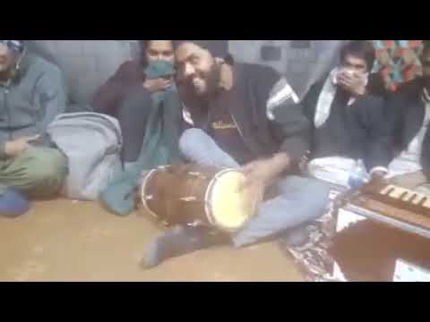 Dholak tuning checking by online Music Store - YouTube