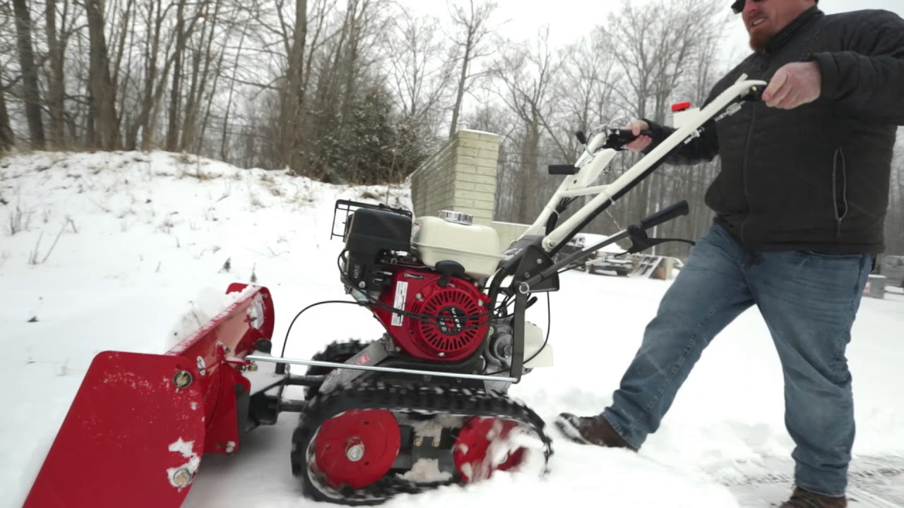 Snow Bull Rolling Up and Over a Curb - YouTube