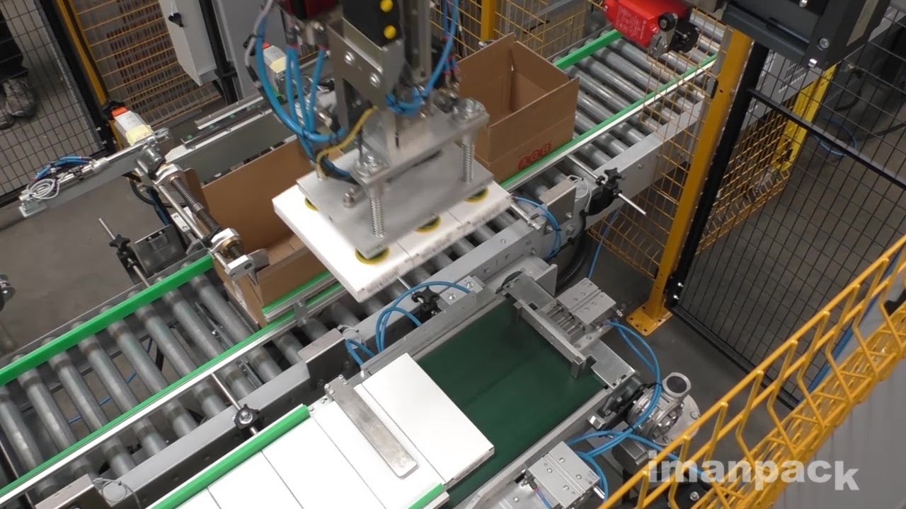 Packaging line with pick and place robot for door locks - YouTube