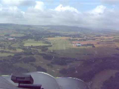 Light Aircraft Landing on Grass Airfield - YouTube