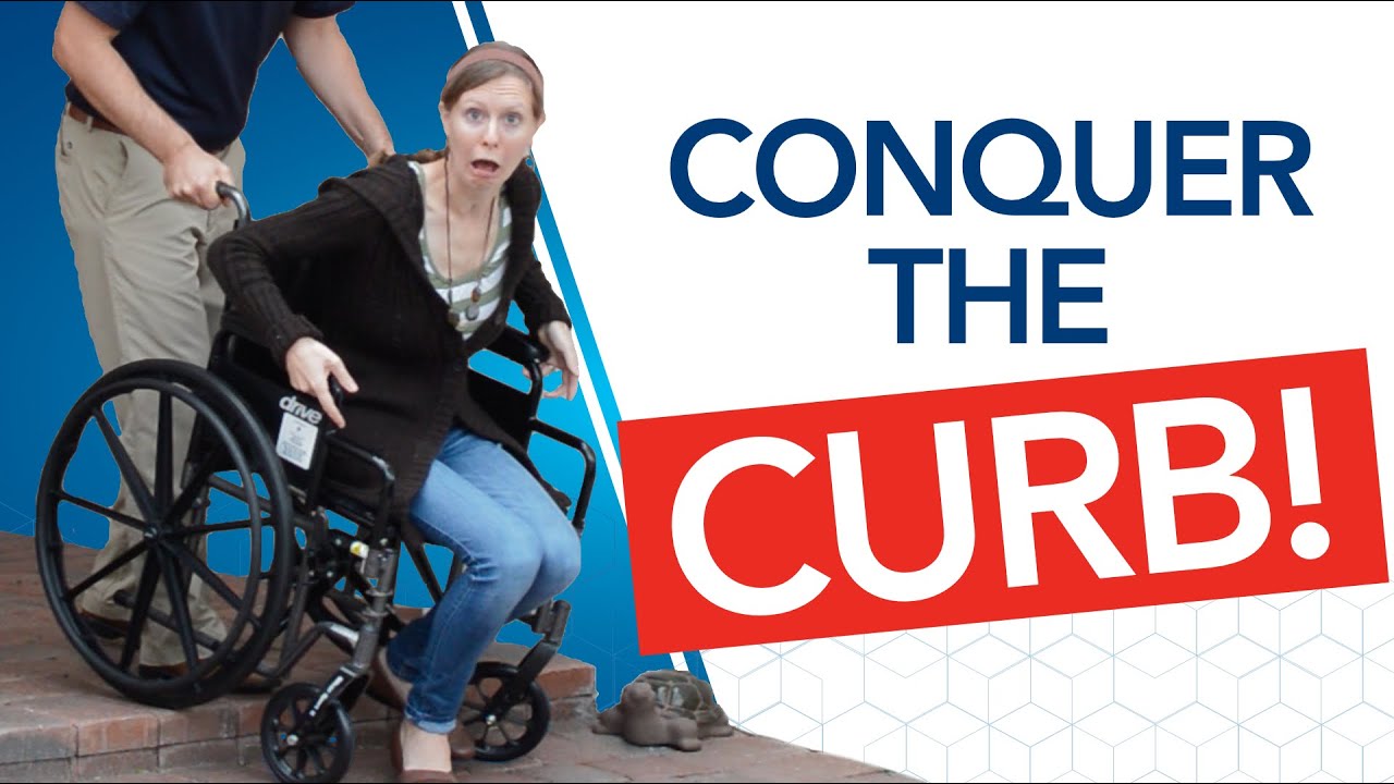 How to Go Up and Down a Curb with a Wheelchair - YouTube