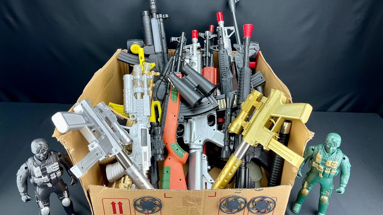 Box of Toy Guns and Black Bead Rifles and Military Equipment - YouTube