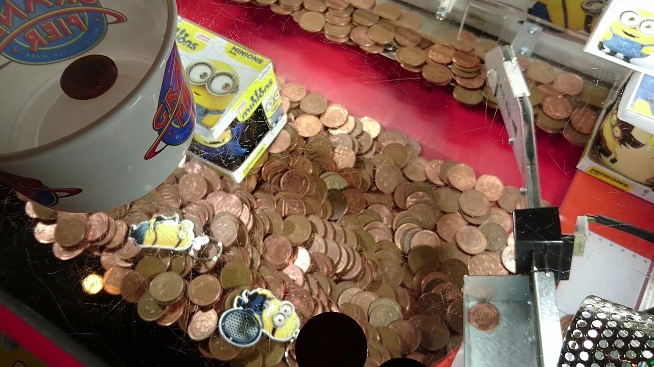 Playing Minions Coin Pusher Machine In The Arcades - YouTube