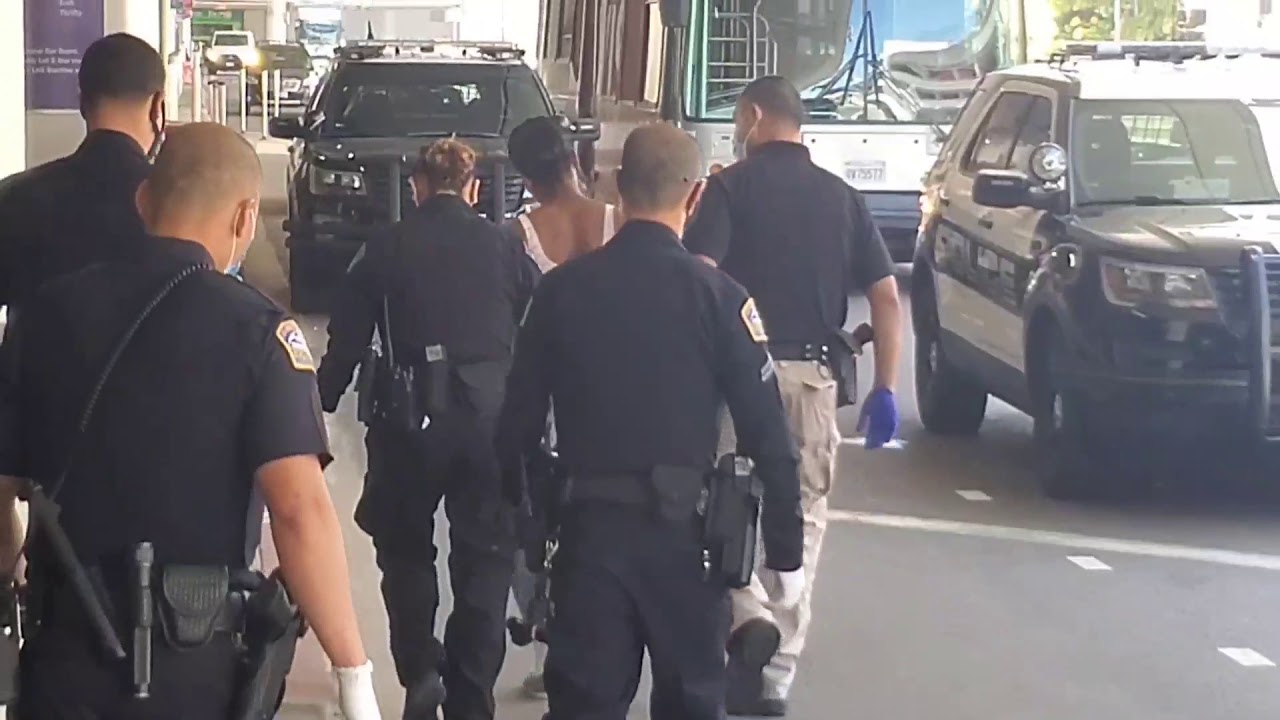 Lax airport police A woman out of control at LAX - YouTube
