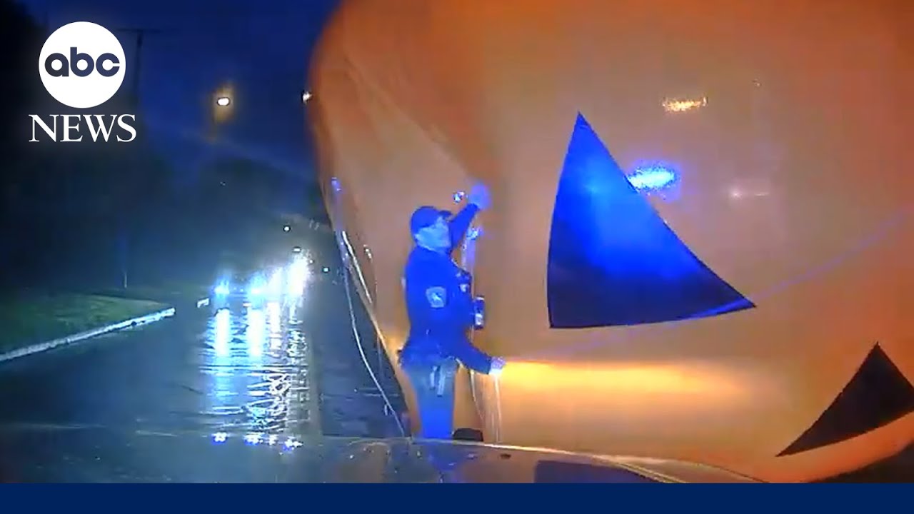 Ohio police officer ‘attacked’ by inflatable pumpkin - YouTube