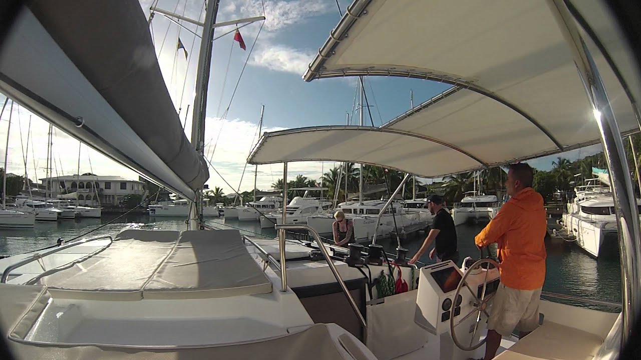Docking a catamaran in a tight spot - YouTube