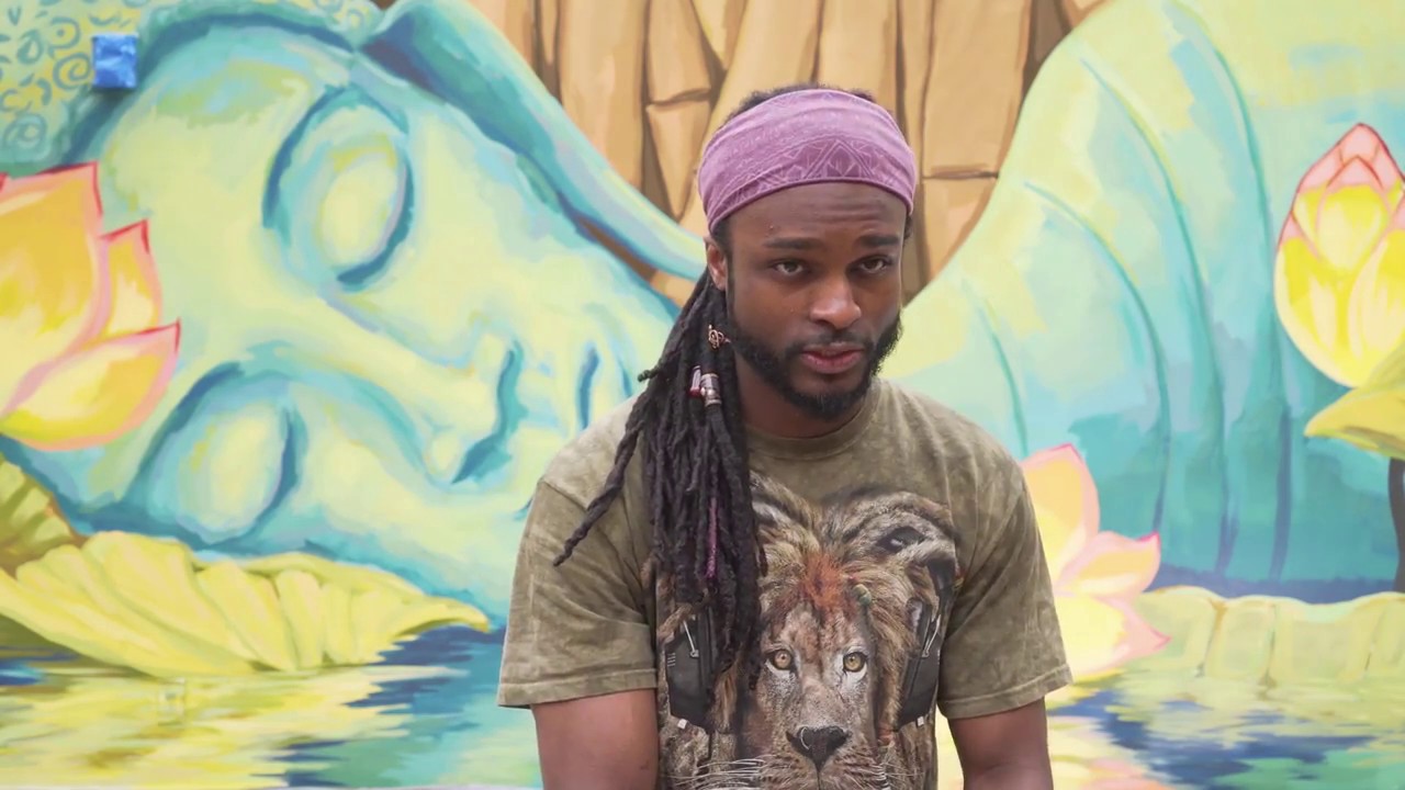 Zay Williams paints a Large Buddha mural at yoga studio in Cleveland ...