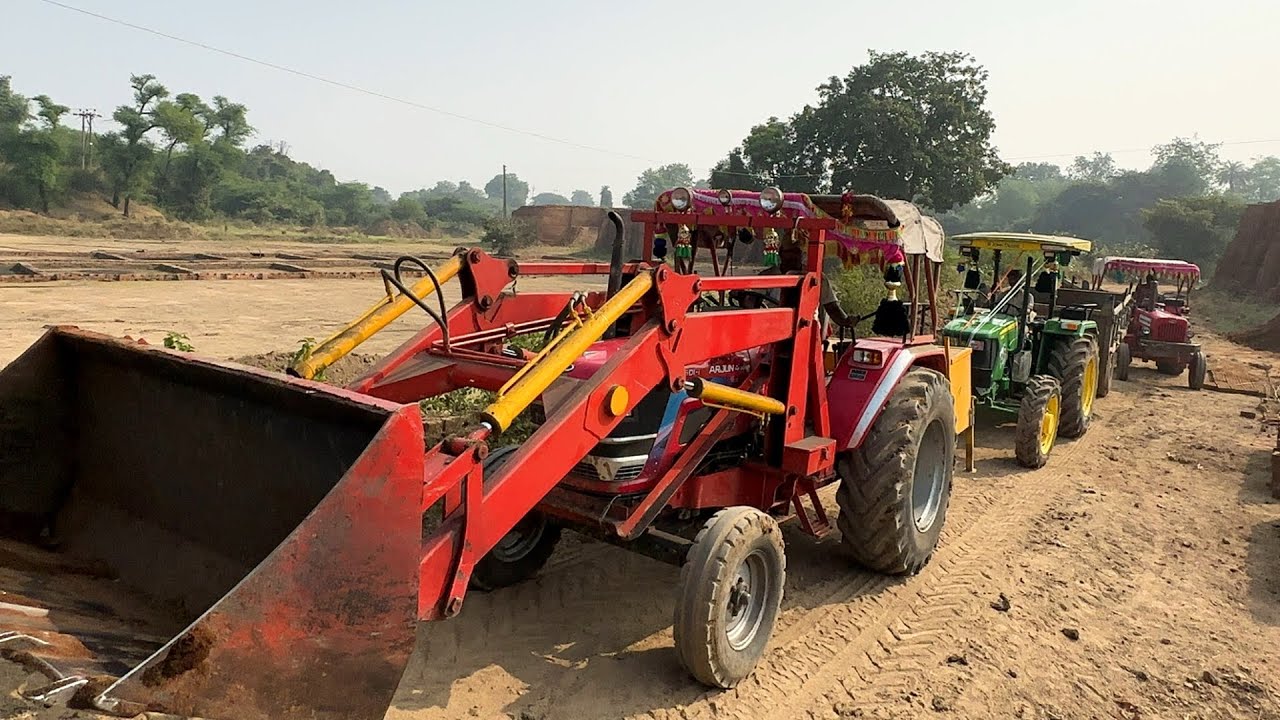 Mahindra Arjun 605 Backhoe Loader Tractor Loading Mud Mahindra 575 Di Plus and John Deere 4WD ...