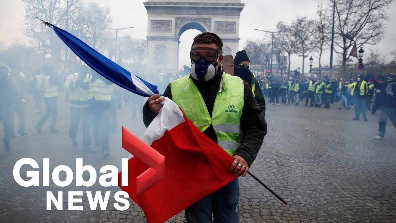 French police clash with 'yellow vest' protesters in Paris - YouTube