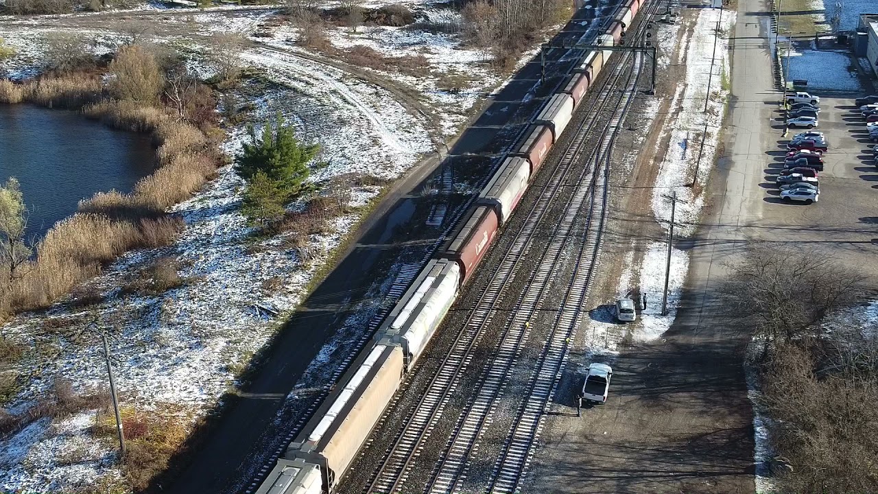 CN locomotives 5752 and 5609 on westbound mixed freight train. Paris ...