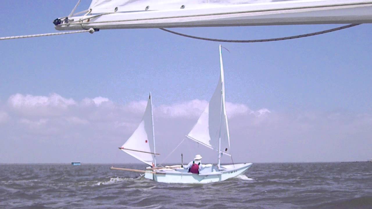 Stan Roberts sailing his Michalak Family Skiff - YouTube