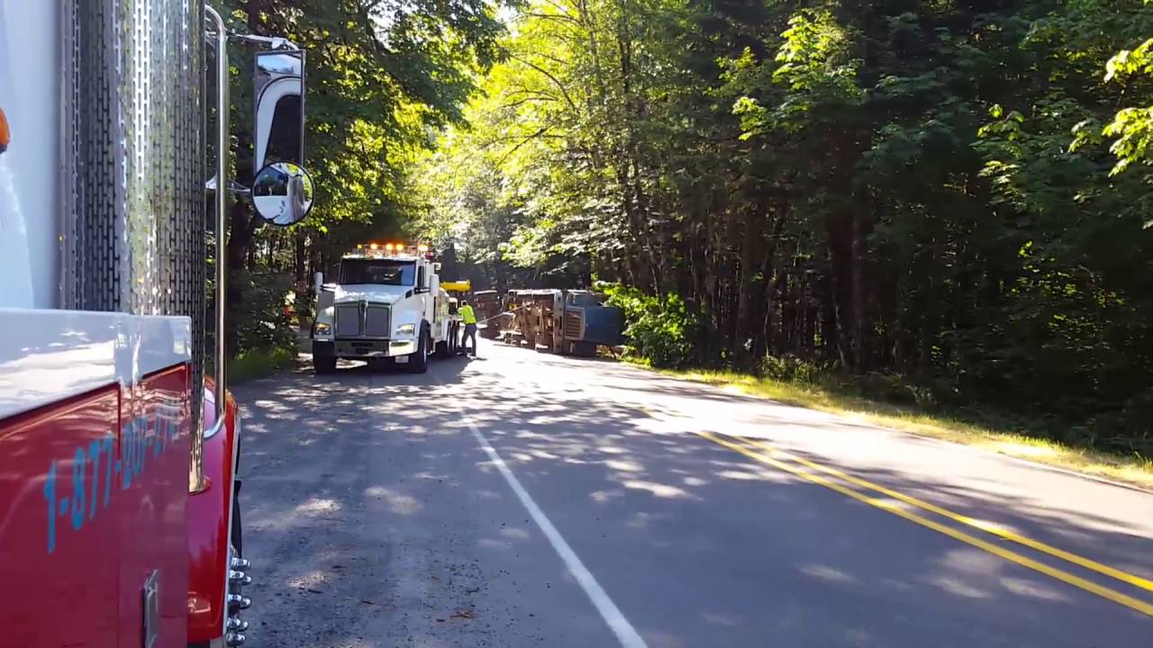 BC Towing uprights a log truck - YouTube