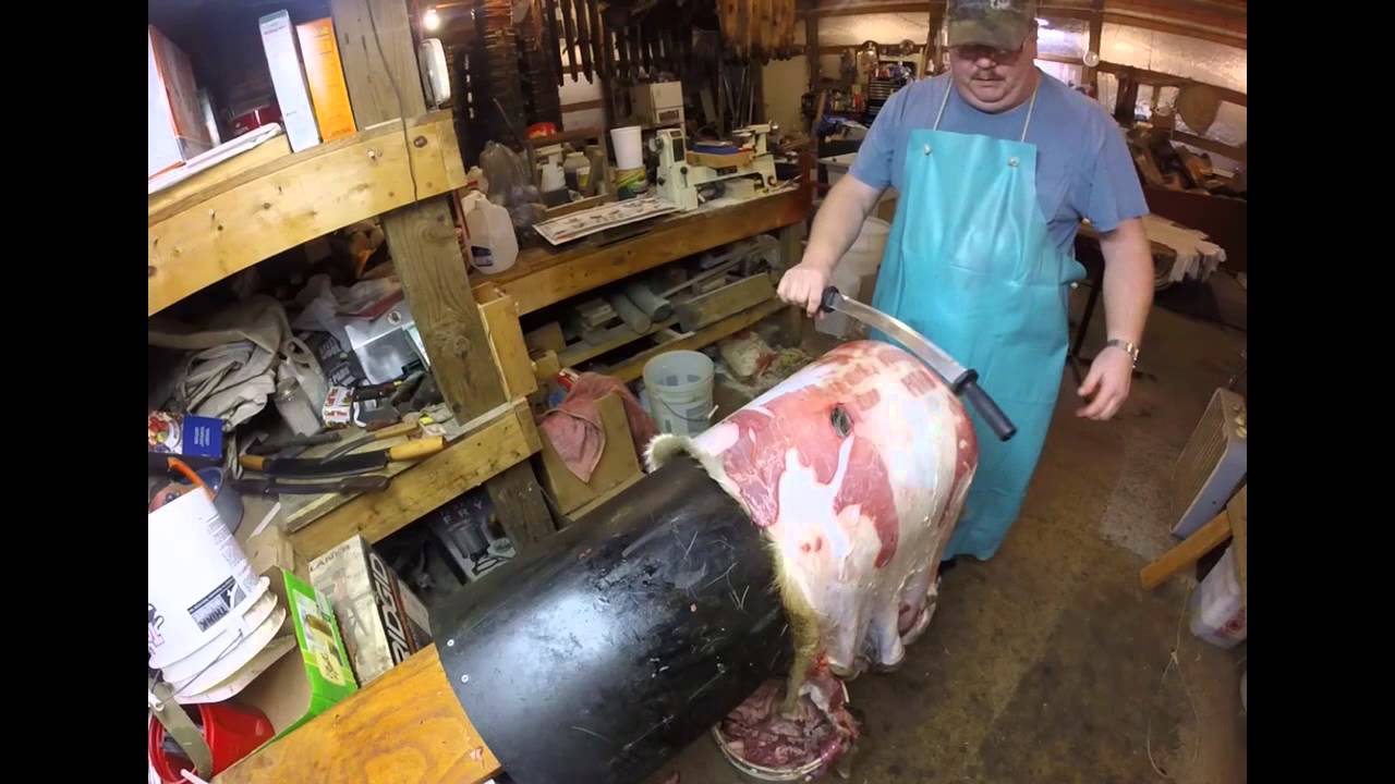 hand fleshing a deer hide - YouTube