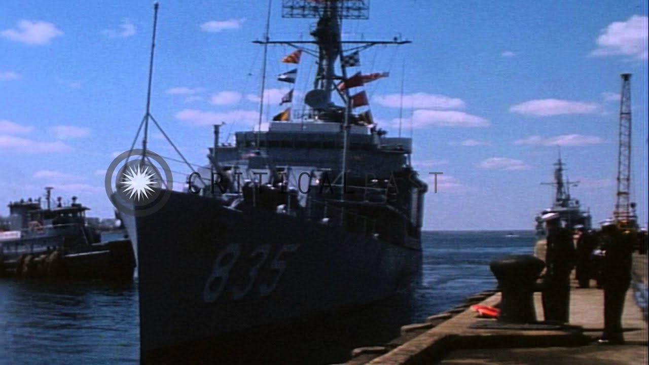 People cheer at a shipyard in Newport, Rhode Island as Desron 20 ...