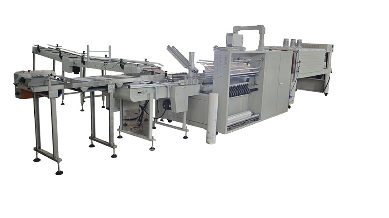 High speed labeling maxi roll paper shrink packing machine - YouTube