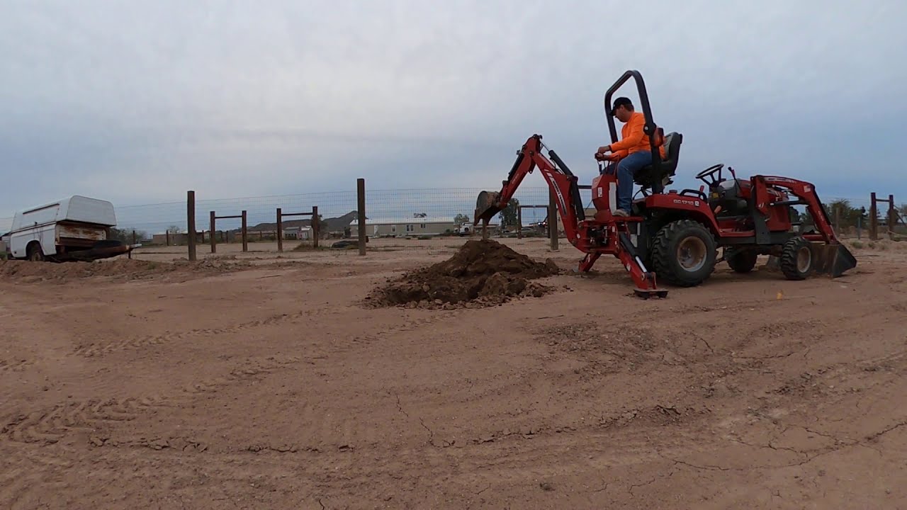 Massey Ferguson GC1710 TLB Digging - YouTube