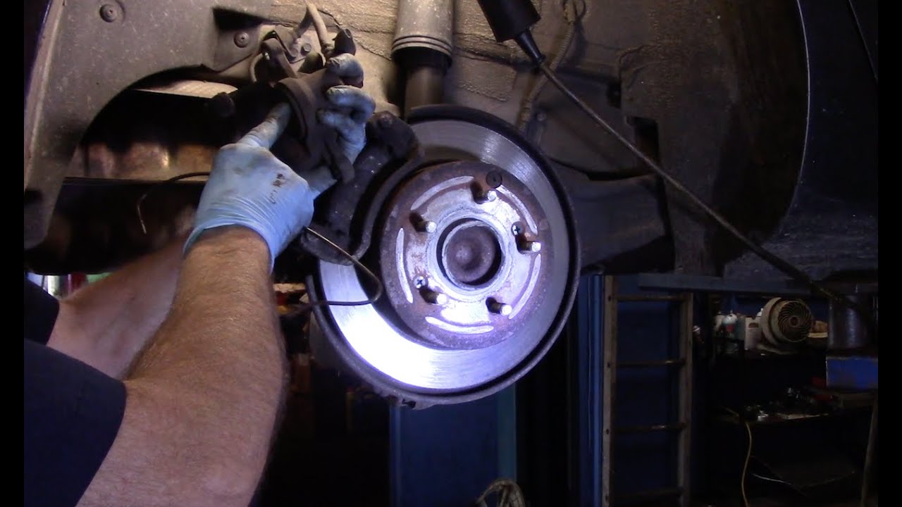 Replace Rear Brakes & Rotors 2007-2010 Kia Rondo - YouTube