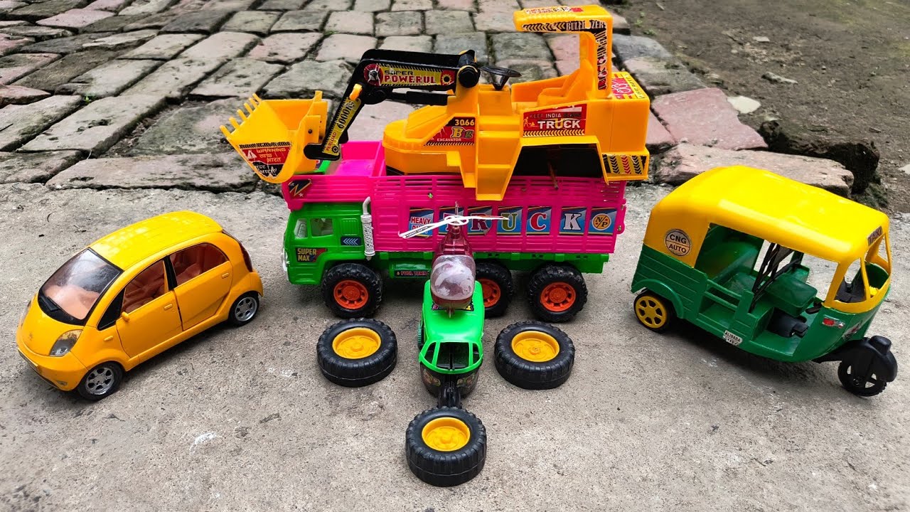 In the ground auto rickshaw, jcb, helicopter find toy and body part ...