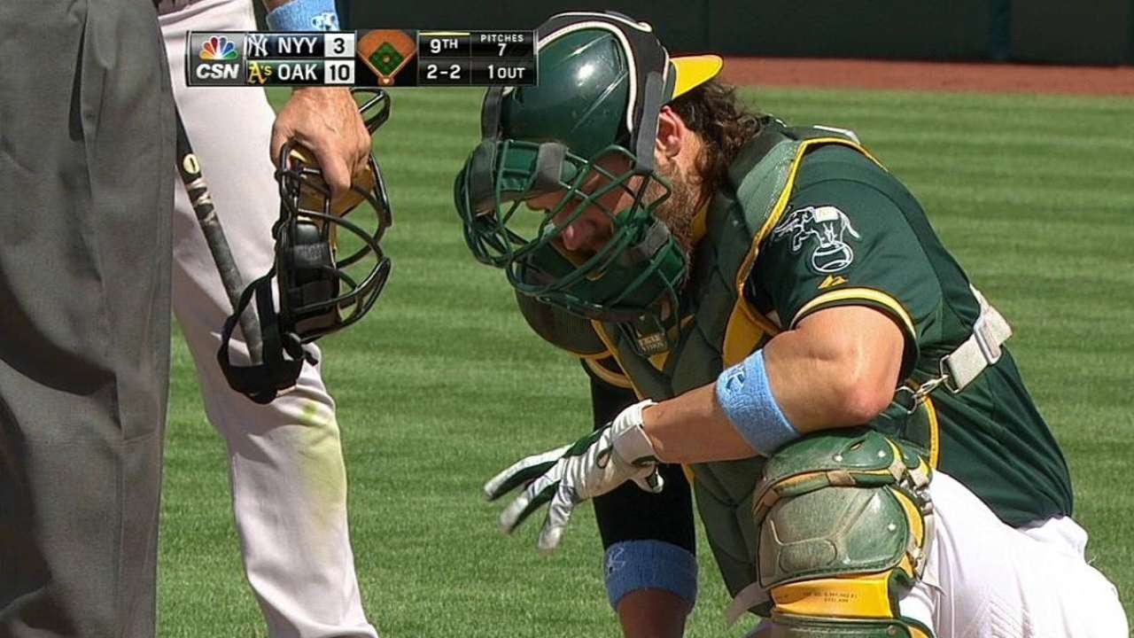 NYY@OAK: A's catchers get ready to enter the game - YouTube
