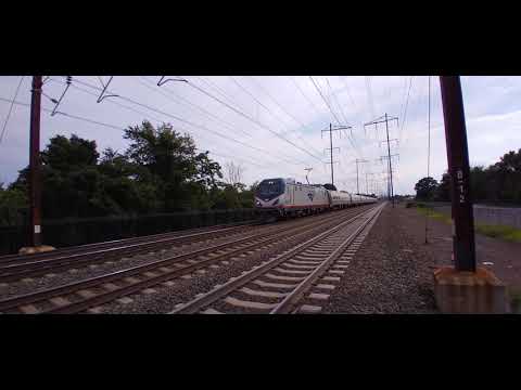 Amtrak train passing the New Brunswick New Jersey station - YouTube