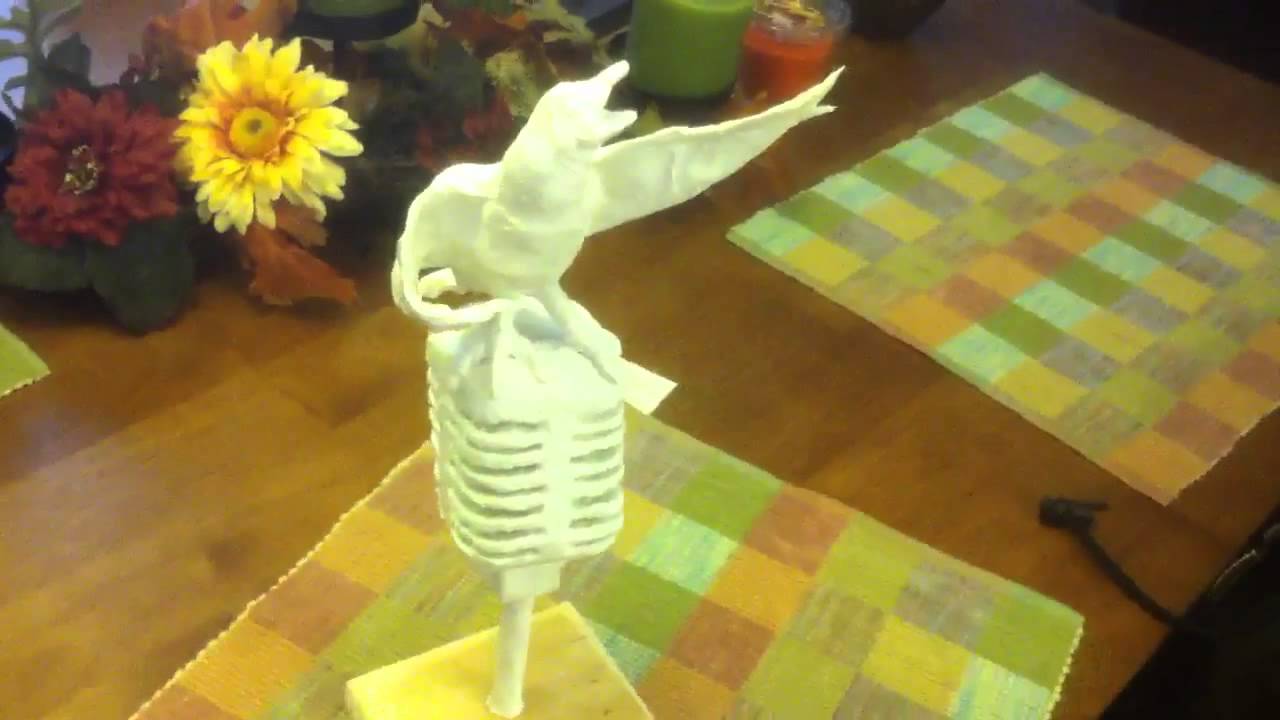 Paper Mâché bird on microphone - YouTube
