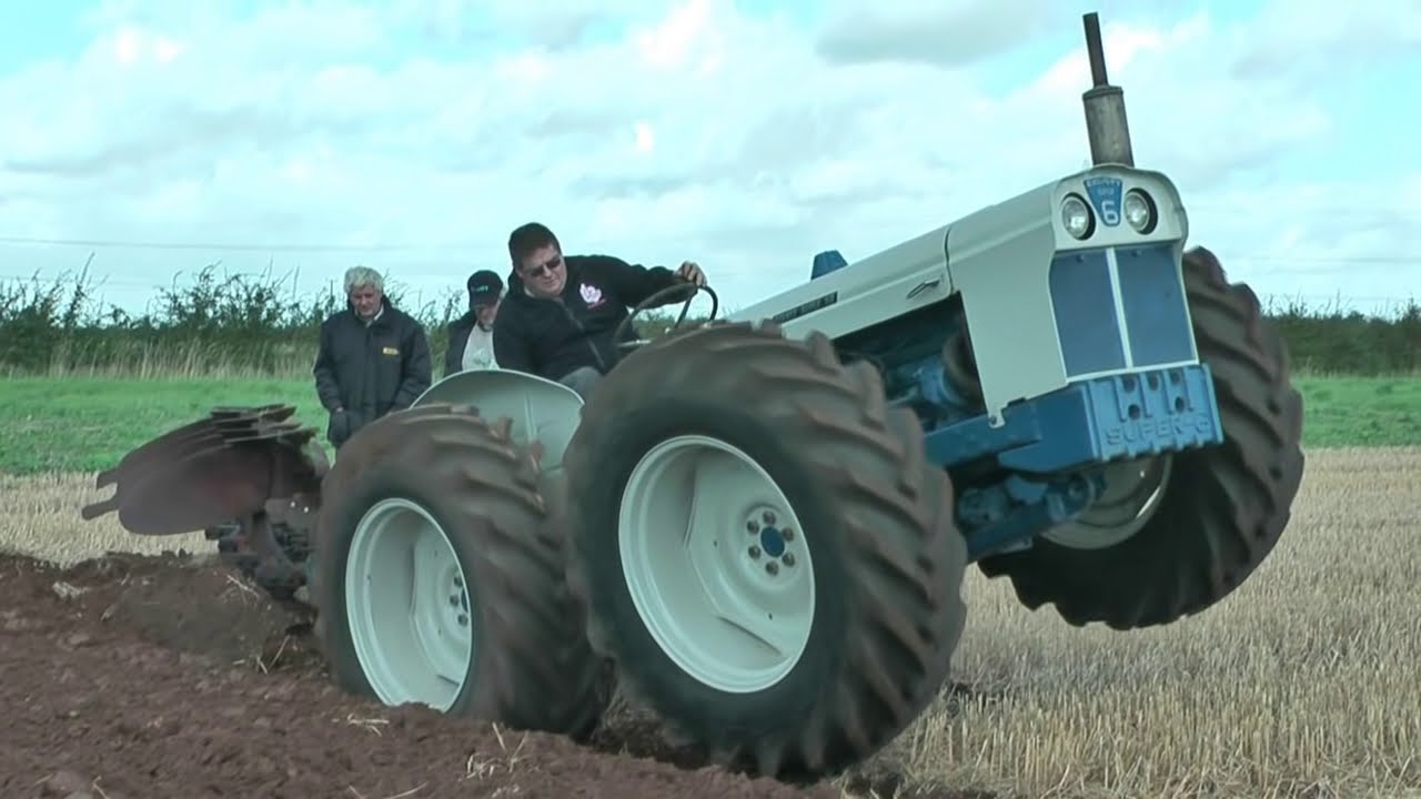 ford county super six tractor pulling hard - YouTube