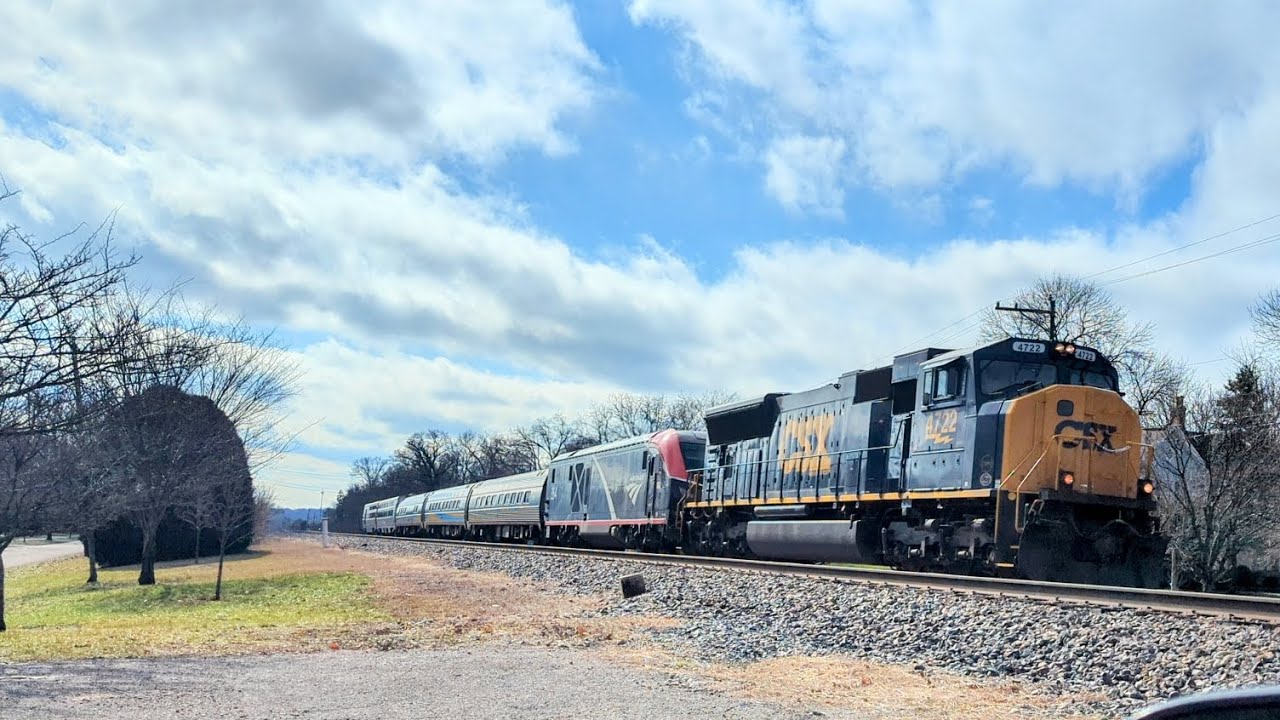 CSX locomotive leading an empty Northbound Amtrak Cardinal P51 on track one - YouTube