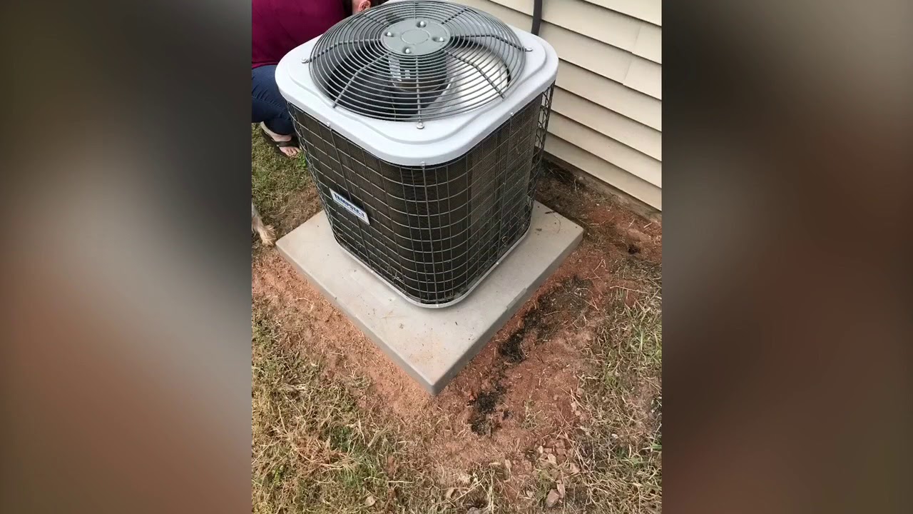 Quick cleanup and brick placing around AC unit - YouTube