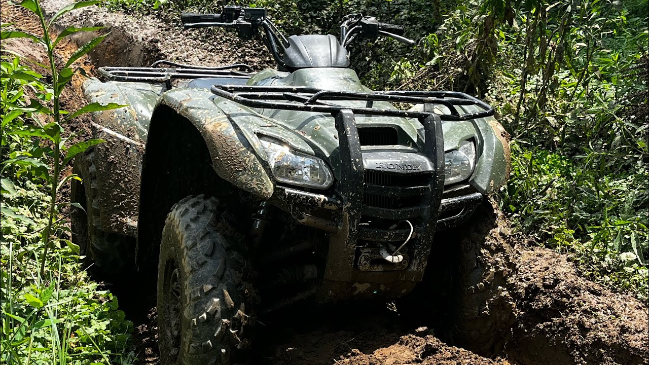 Hitting some mud on the rancher 420 - YouTube