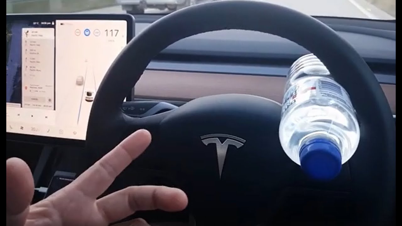 Tesla says water bottle hack is driver's problem - YouTube
