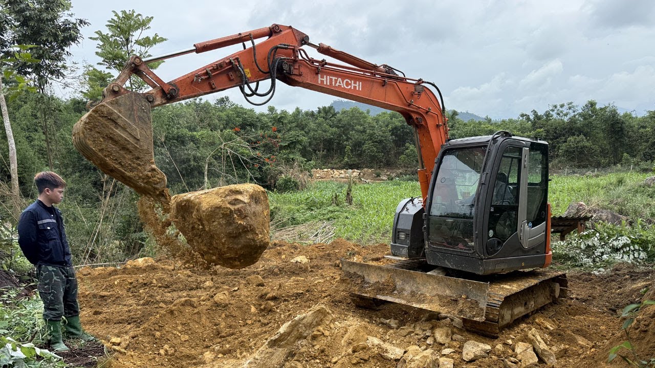 Meet large rocks and hire an excavator to dig rocks for the foundation ...