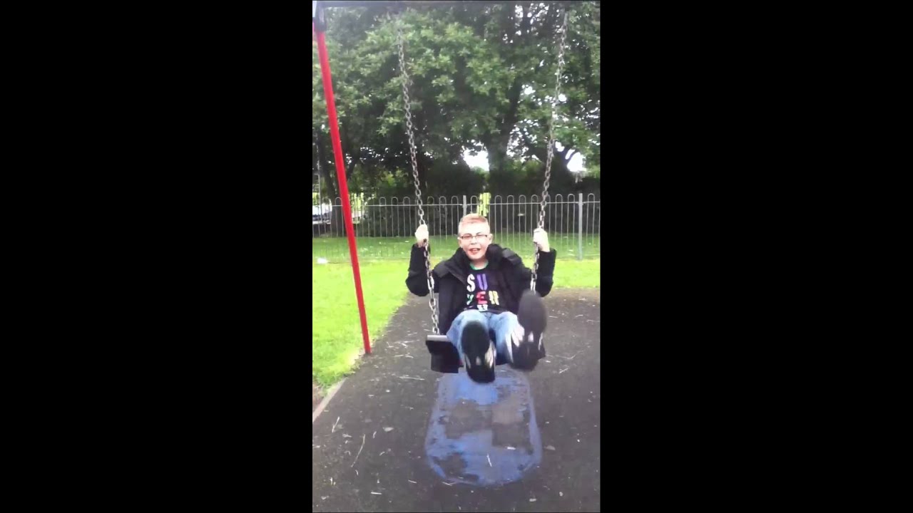 Dude falling off the swing at people's park a - YouTube