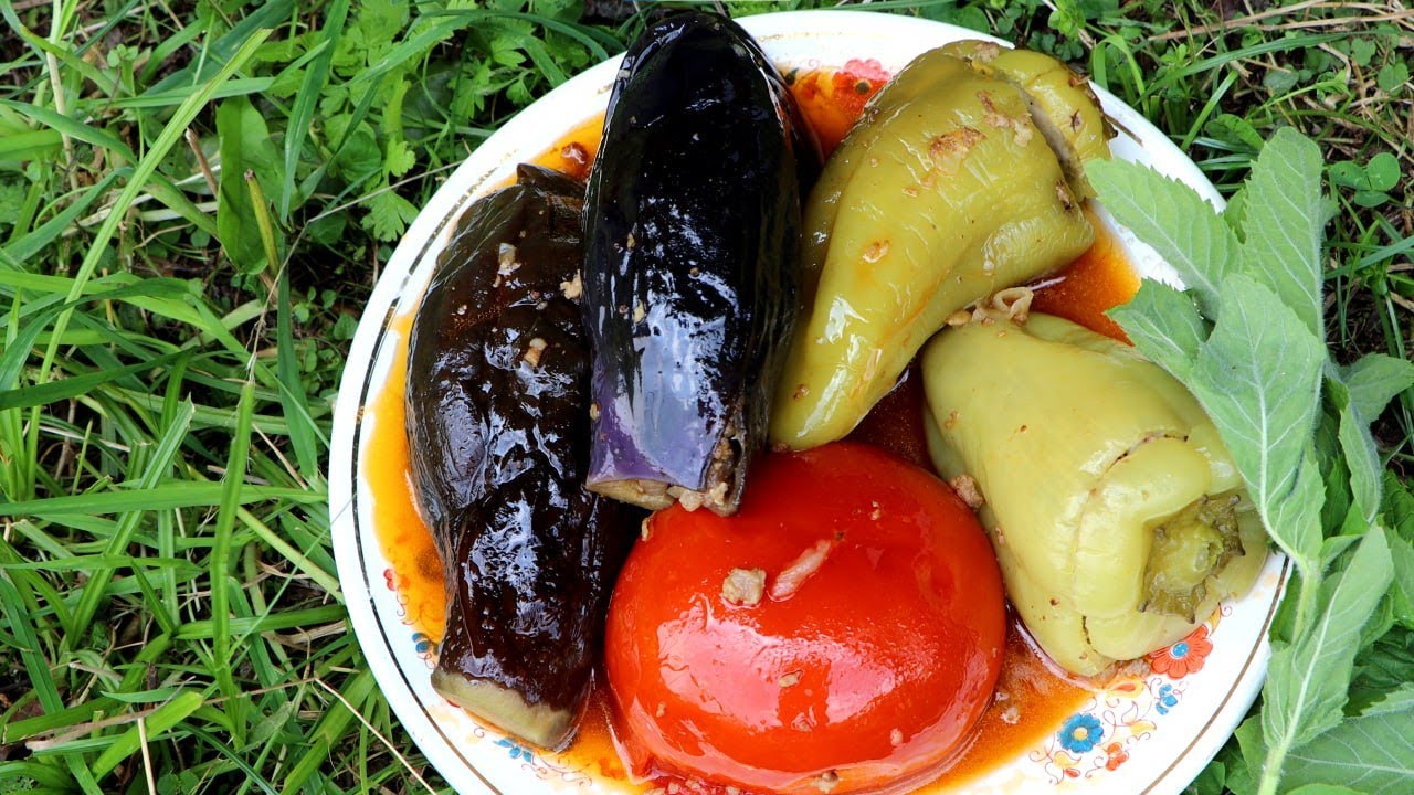 Cooking Dolma with Stuffed Tomatoes, Eggplants, and Peppers Over the ...