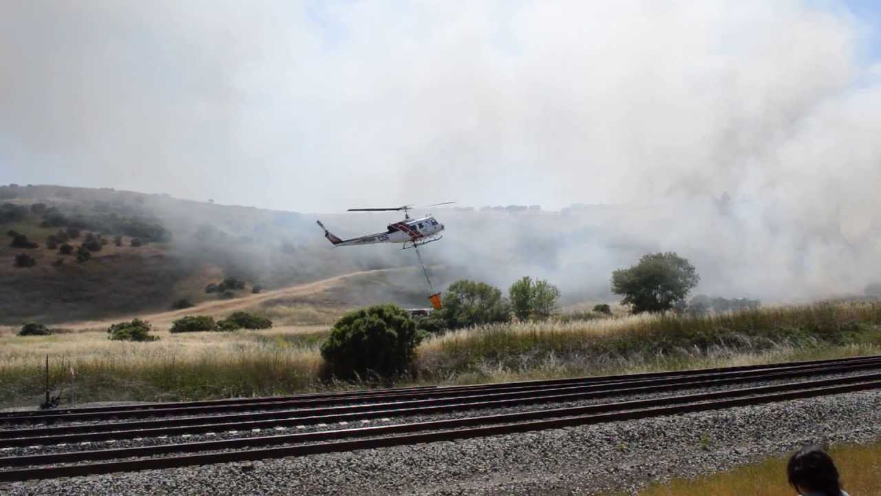 CDF helicopter fighting a brush fire on Communication Hill - YouTube