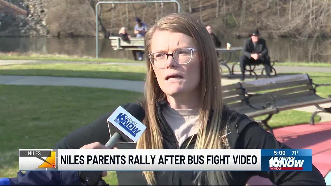 Niles parents hold rally in response to school bus fight video - YouTube