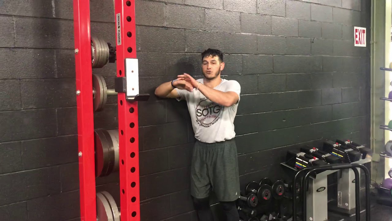 Standing External Rotation Hold to Wall - YouTube