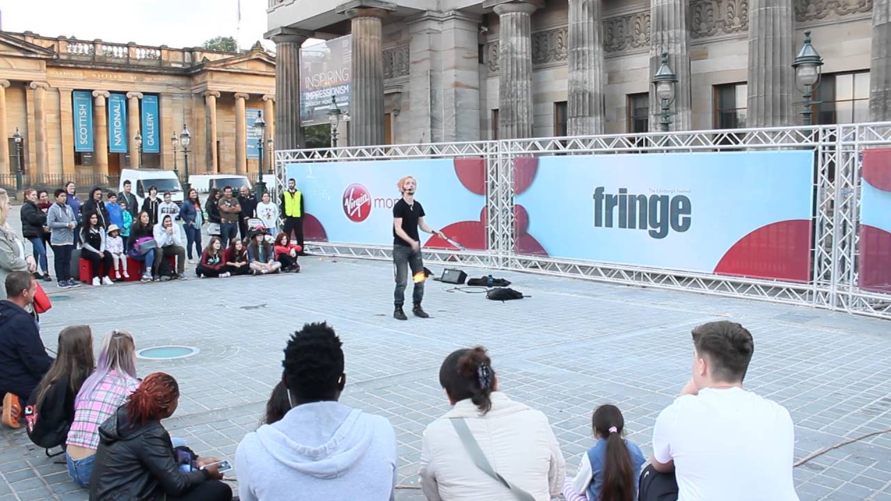 Failed juggling of fire on the street of Edinburgh City Center - YouTube