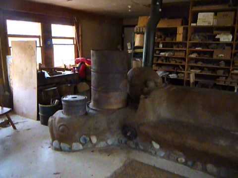 Cob Bench with Rocket mass heater! - YouTube