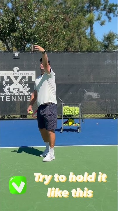 The tennis serve technique- How to toss the ball - YouTube