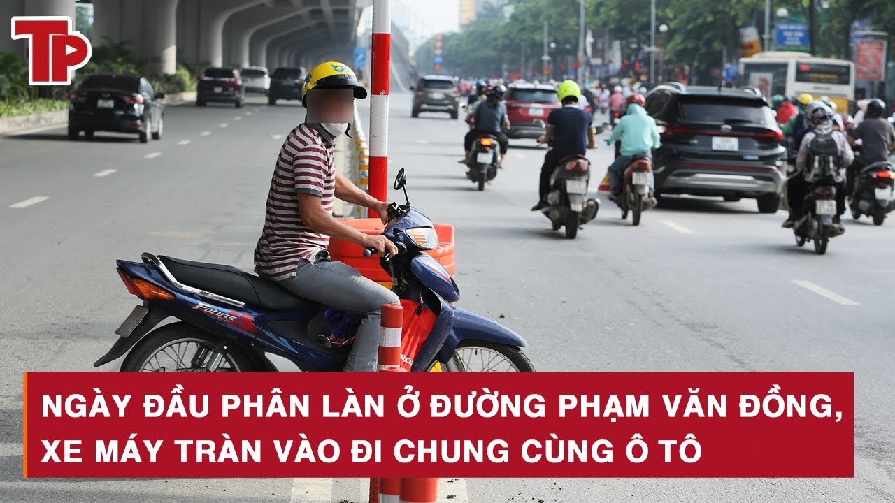 Ngày đầu phân làn ở đường Phạm Văn Đồng, xe máy tràn vào đi chung cùng ...