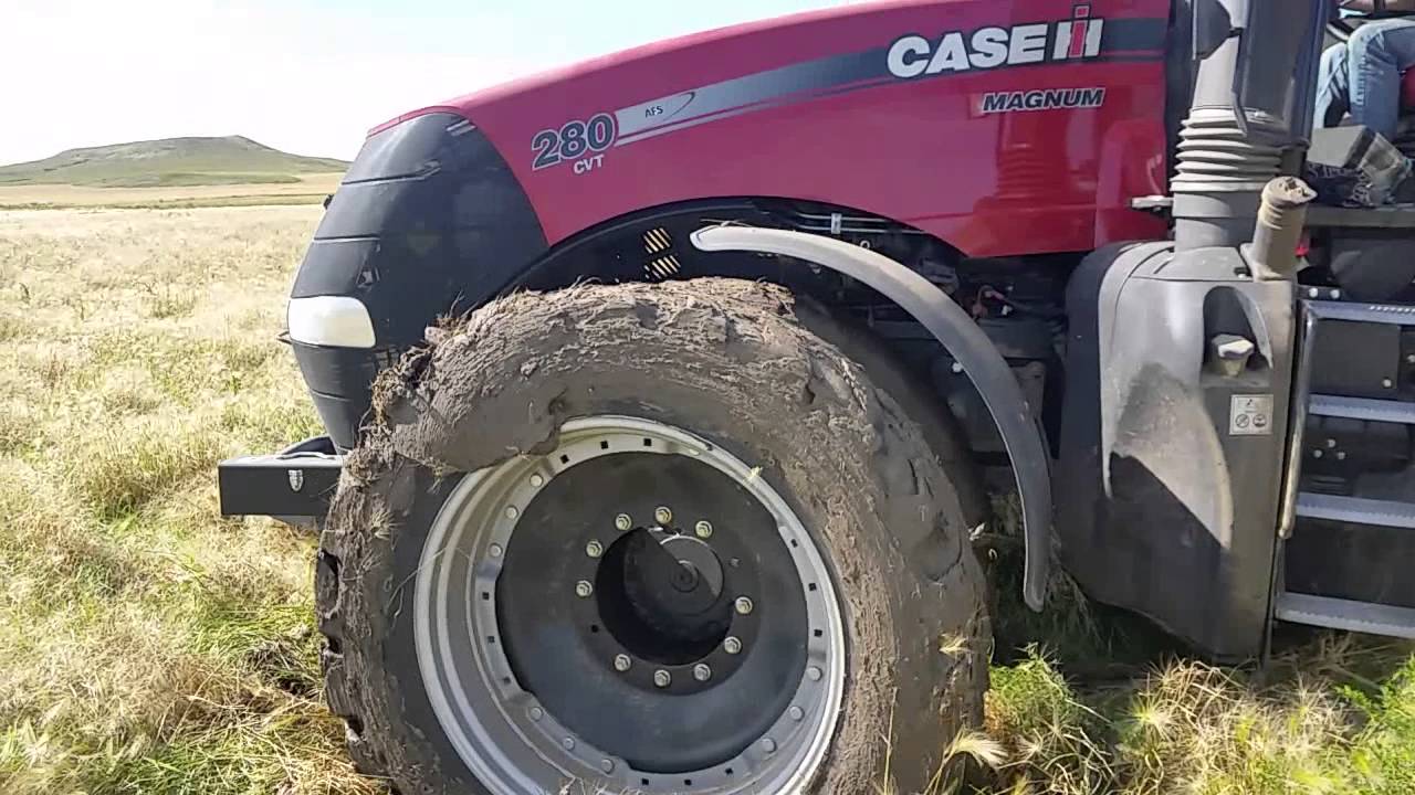 Case magnum 280 cvt stuck in mud - YouTube