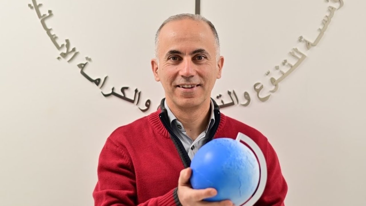 Professor Fr. Fadi Daou receives the trophy of the 2020 Elevate Prize ...