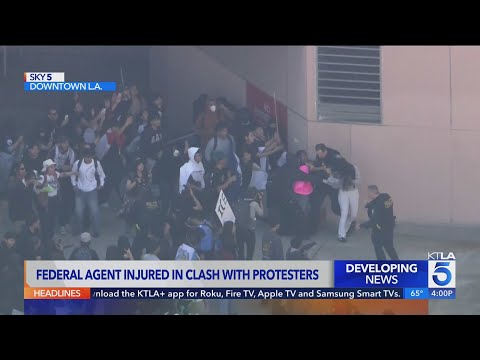 Federal agent injured in clash with L.A. students during protest