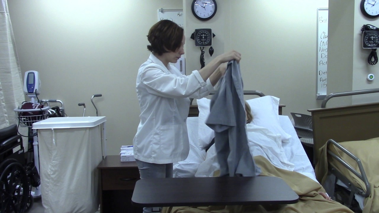 NA Skill Dressing resident with affected arm - YouTube