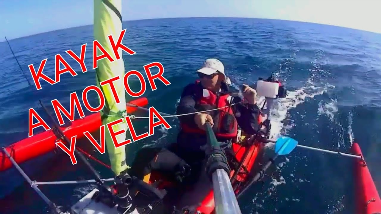 Kayak trimaran con motor 2.5 hp Ocean Bay y vela. - YouTube