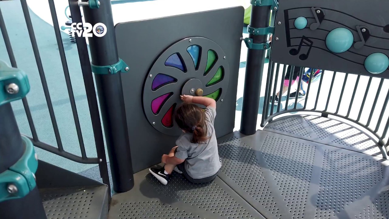 ADA-friendly playground features many attractions - YouTube