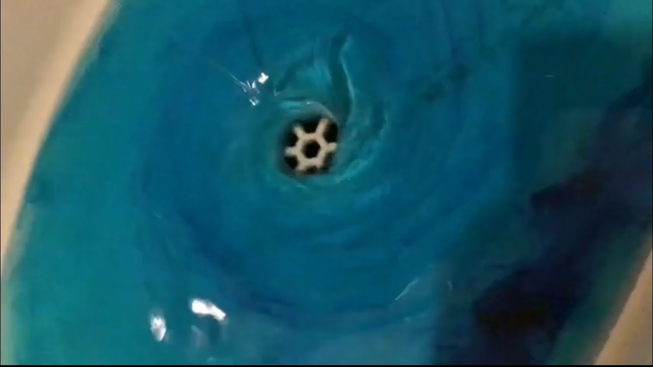 Very Cool Whirlpool in the laundry sink with blue food colouring - YouTube
