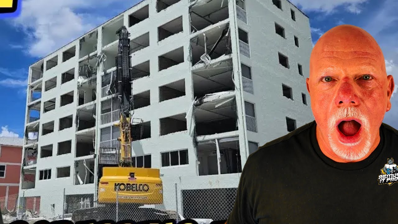 7 Story High Rise Live Teardown Removing The 2 Staircase Towers and ...