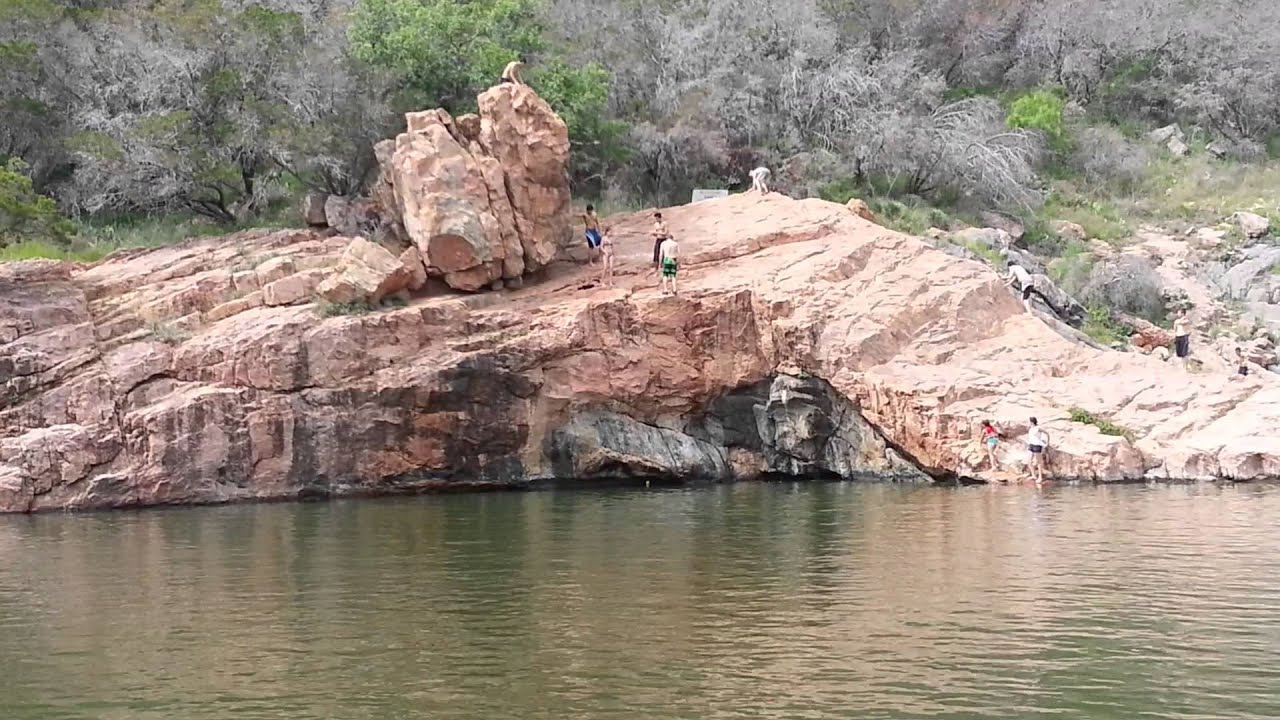 Back flip off the cliff at Inks Lake in the Devils - YouTube