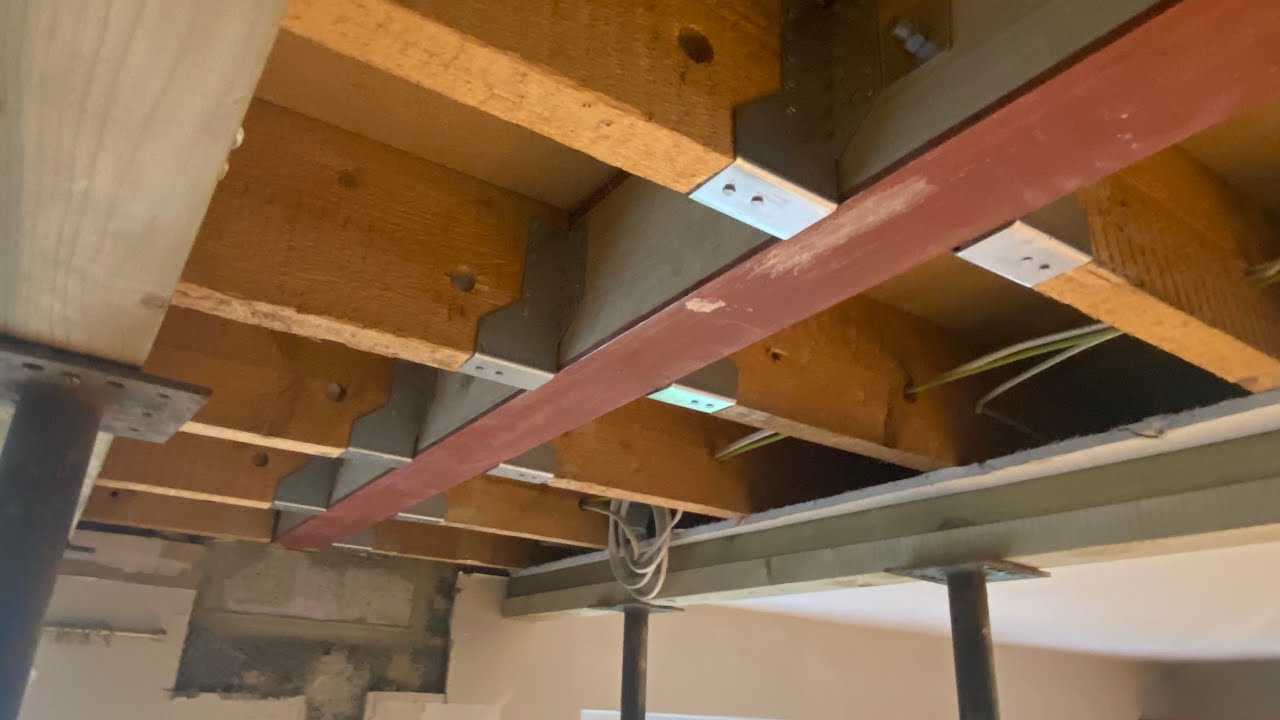 Installing a steel beam in the ceiling - YouTube